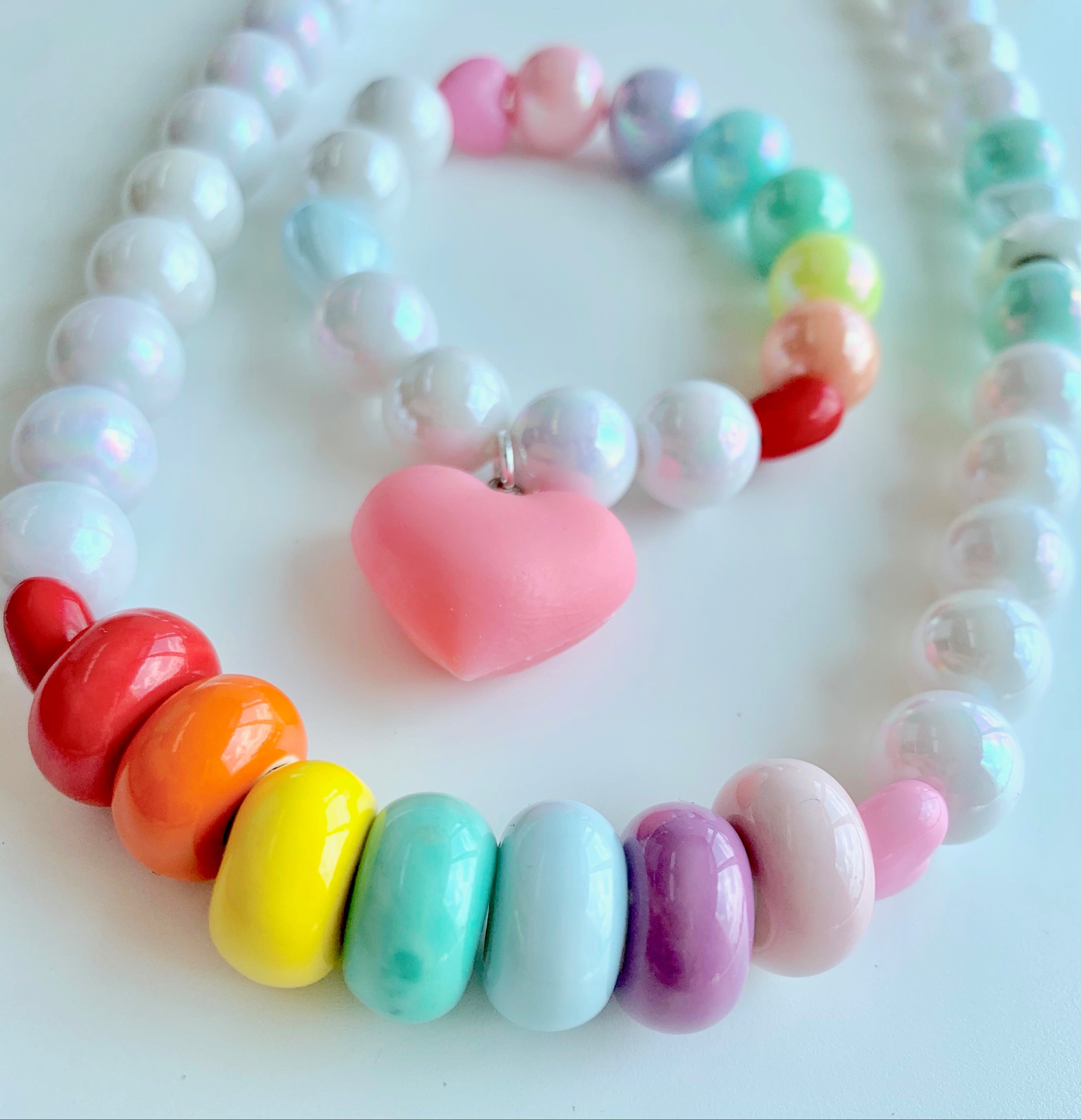 Colour Loops & Pink Hearts – red bobble